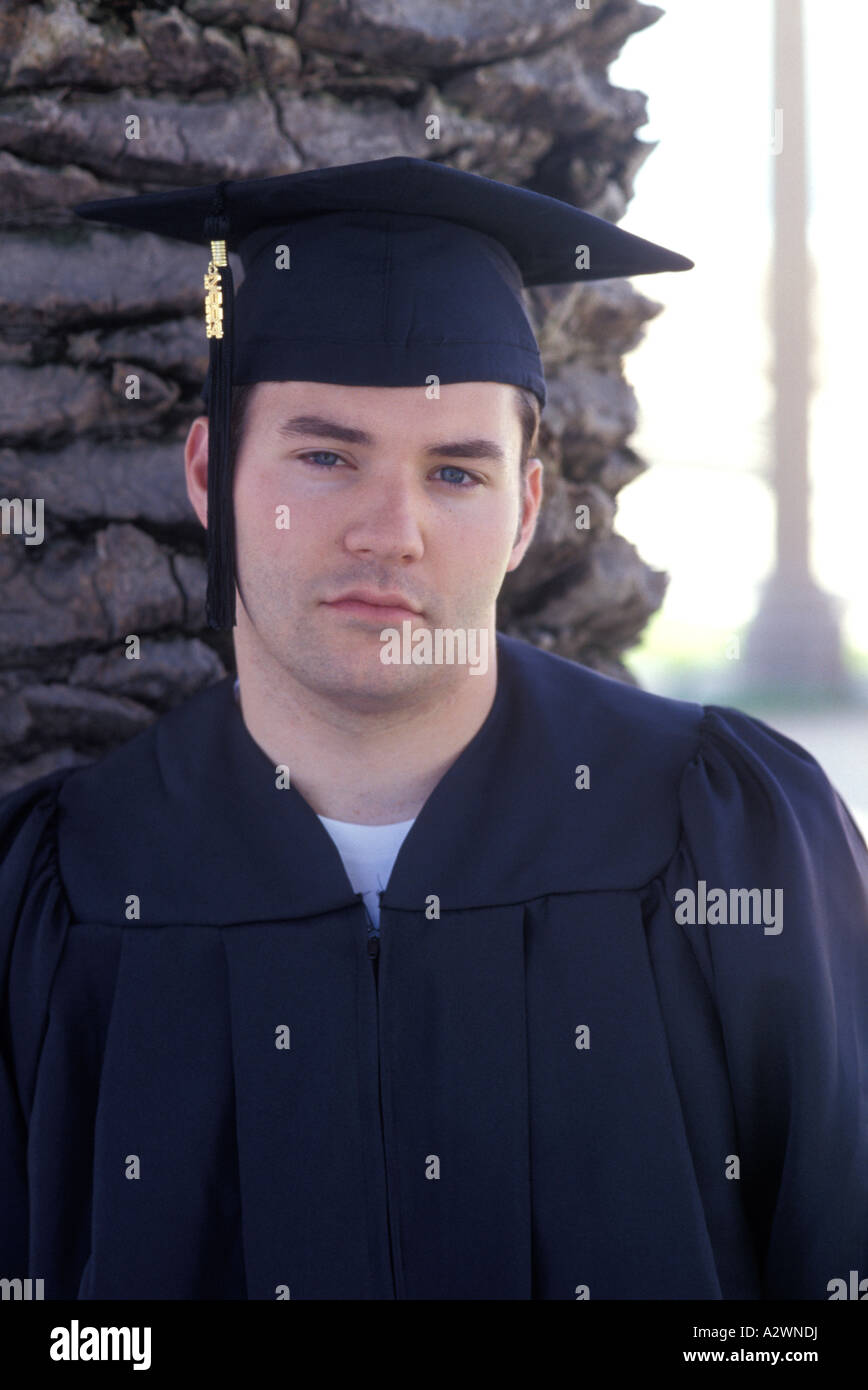 Young man in graduation outfit hi-res stock photography and images - Alamy