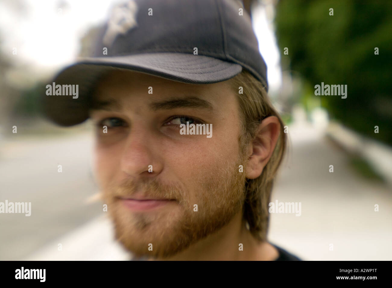 Young man wearing cap, portrait Stock Photo - Alamy