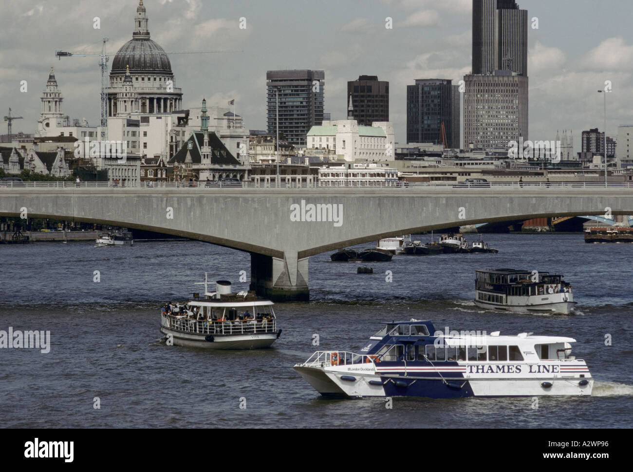 boats crossing under Waterloo Bridge, river Thames, London Stock Photo ...