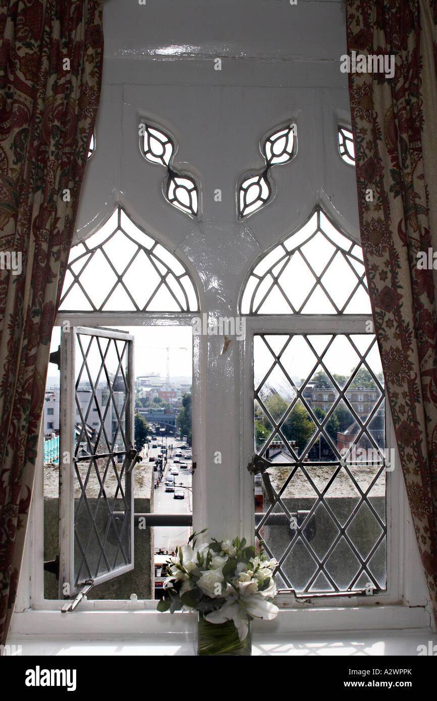 Unusual view of window inside Tower Bridge with road traffic London SE1 ...