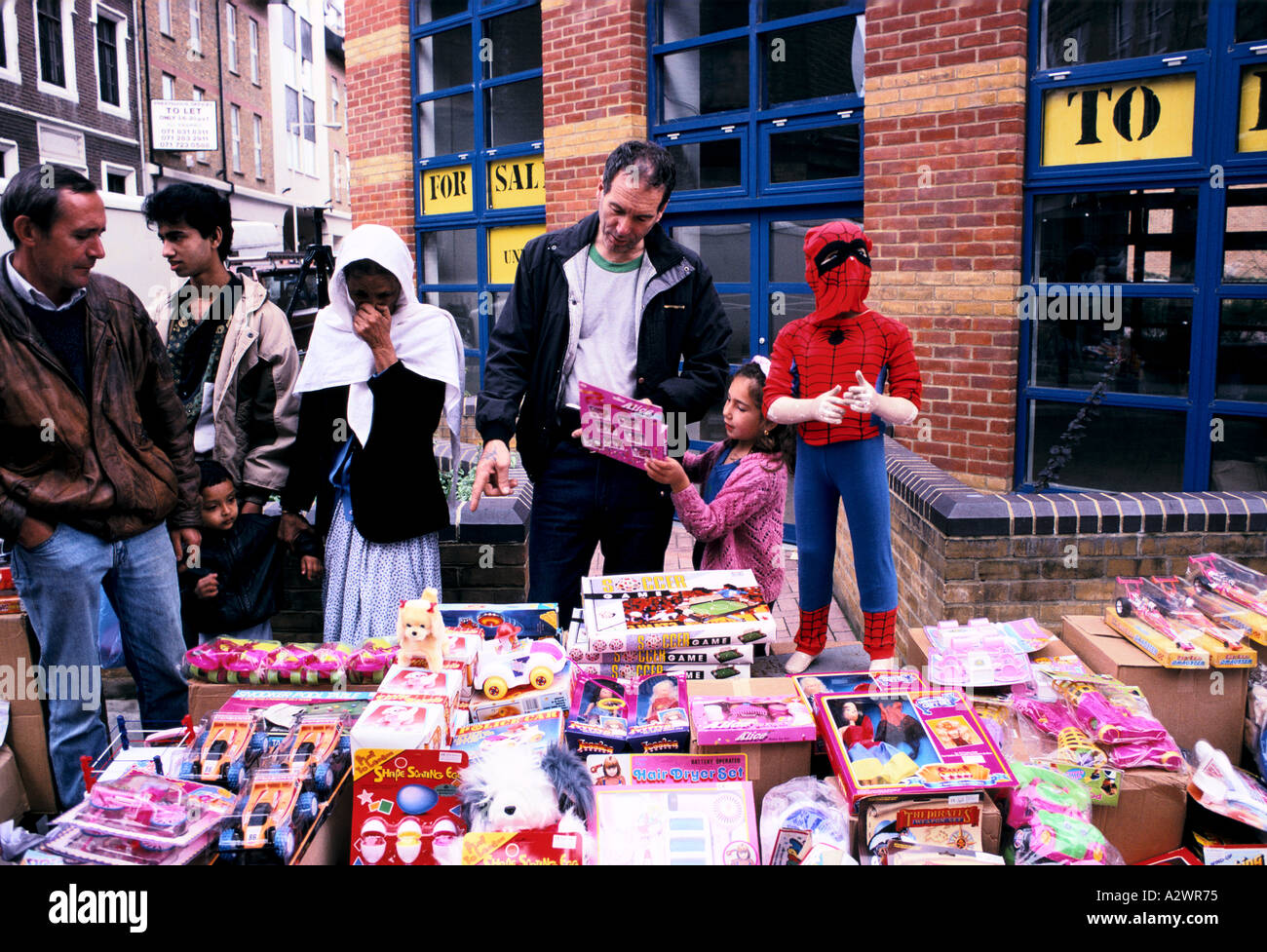 brick lane area 1993 people browsing Stock Photo - Alamy