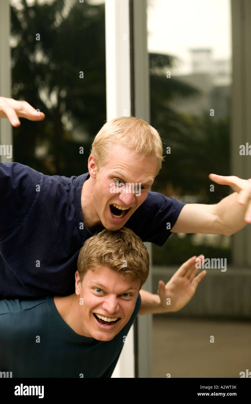 Young men gesturing, portrait Stock Photo - Alamy