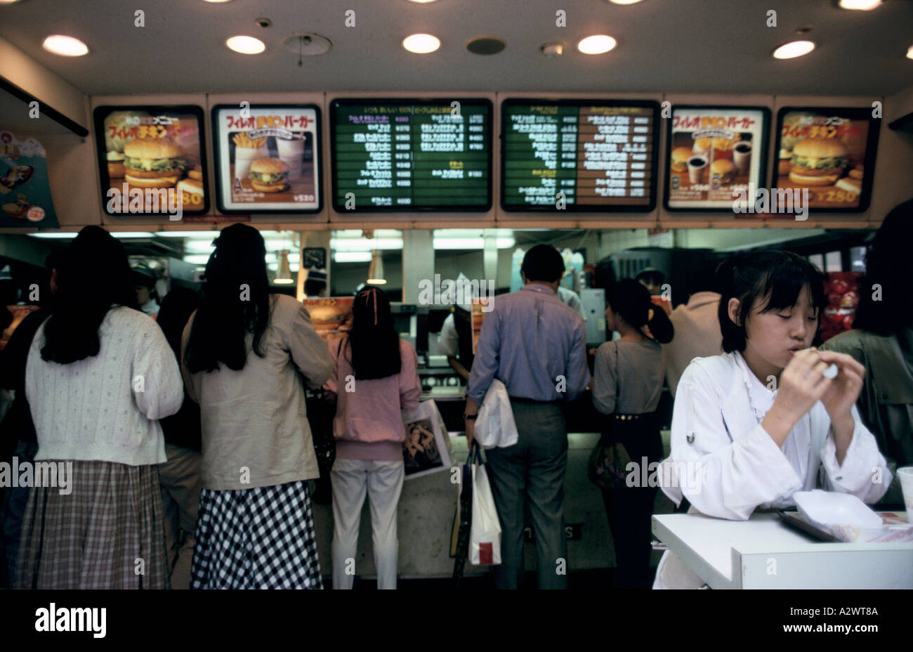 people ordering at the counter of a mcdonalds restaurant tokyo japan ...