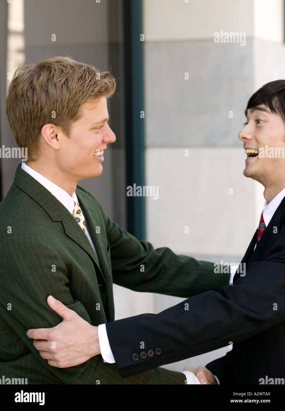 Businessmen suits conversing hi-res stock photography and images - Alamy