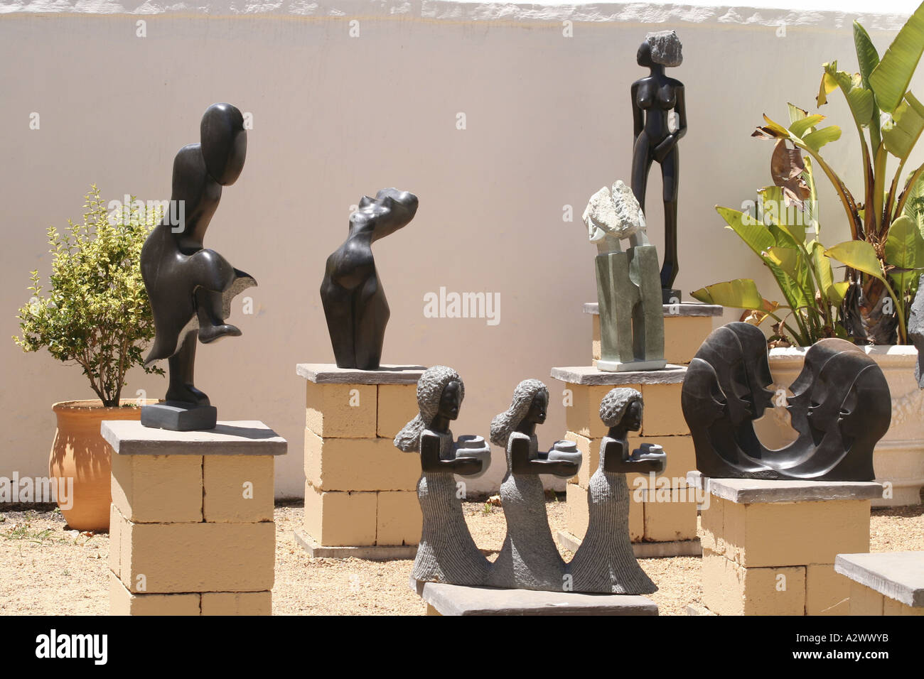 African Art sculpted and on display Stock Photo - Alamy