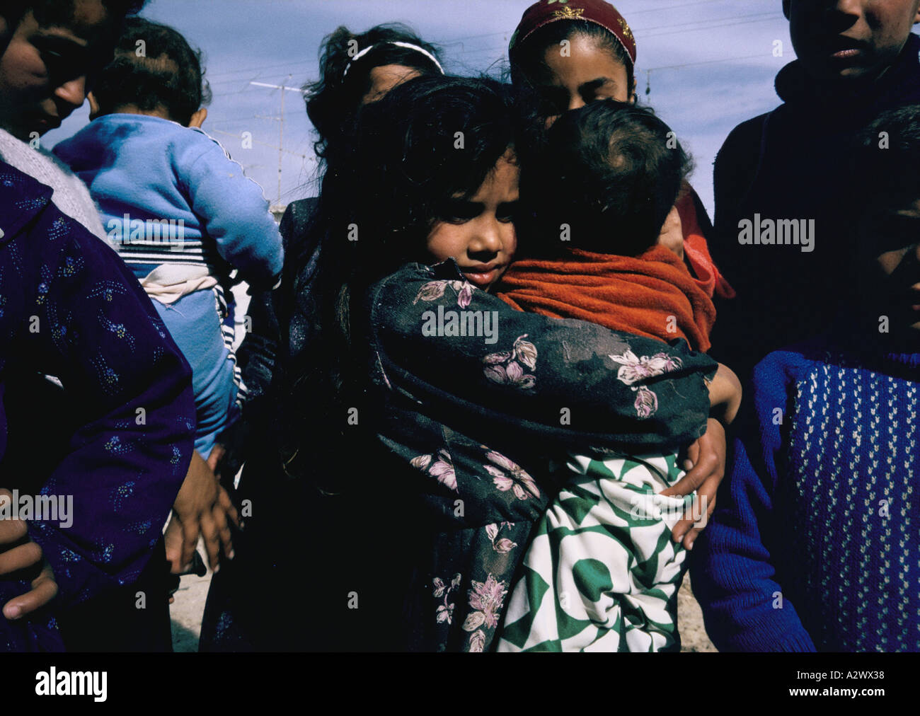 Two children hugging in Beach (Shatti) refugee camp, Gaza, Israeli ...