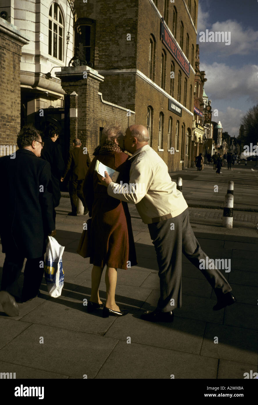 Kissing hello greeting hi-res stock photography and images - Alamy