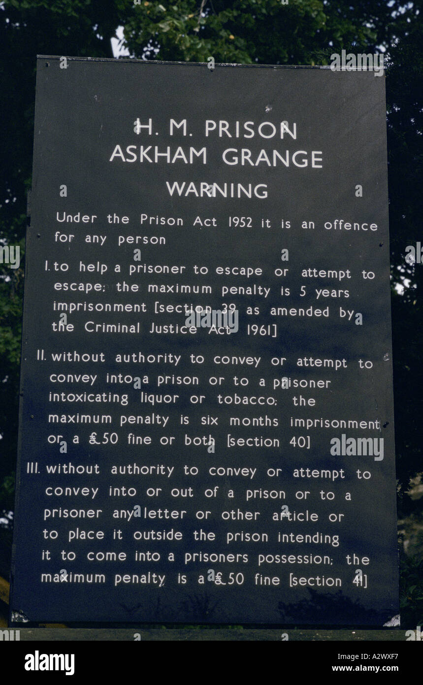 A sign displayed outside the prison warning the public not to aid a ...