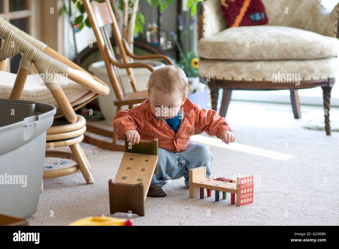 Toddlers Playing With Pegboard