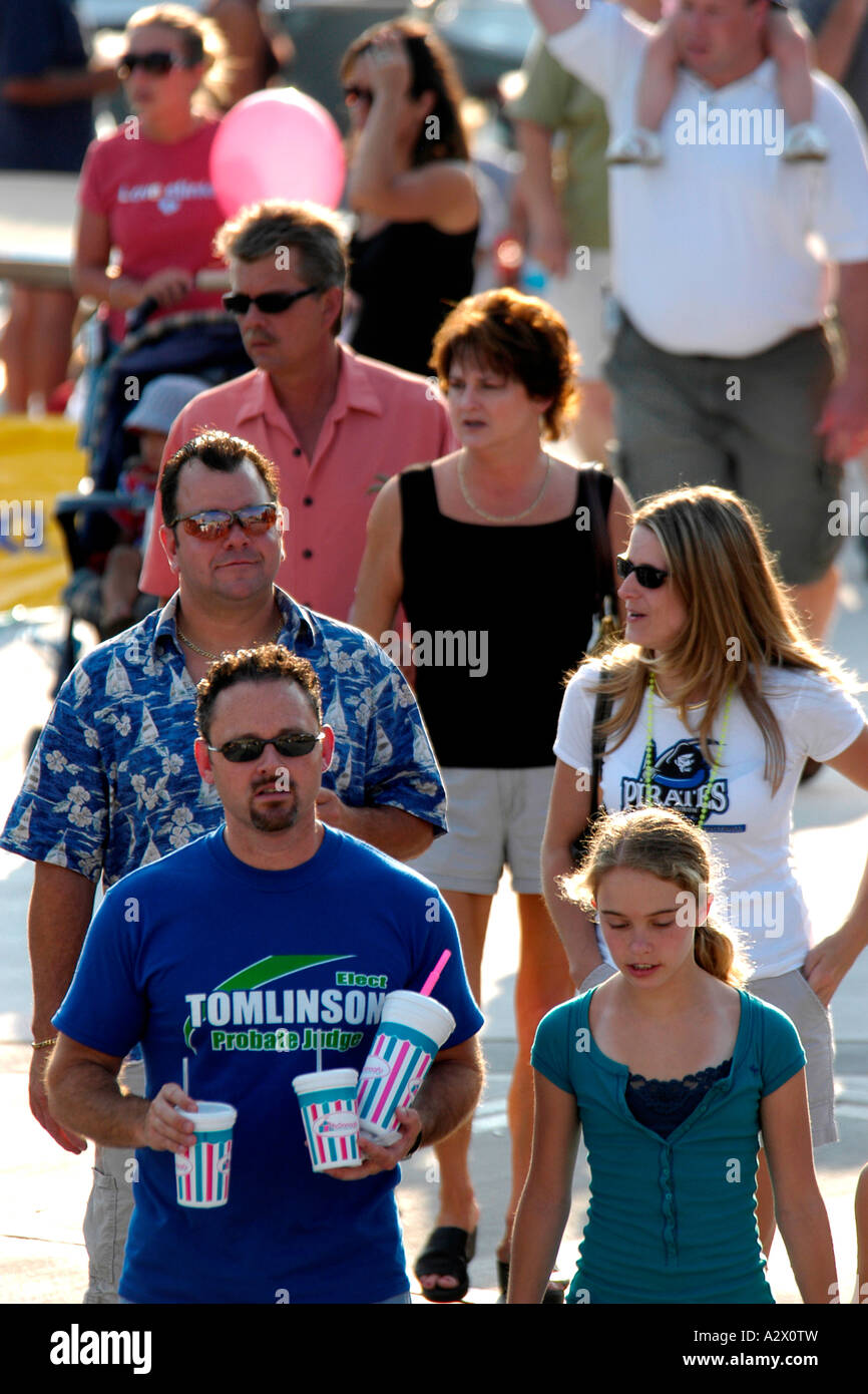 A large group of people all walking in the same direction Stock Photo ...