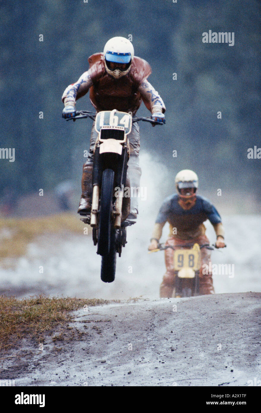 Motocross motorcycle riders coming towards camera Stock Photo - Alamy