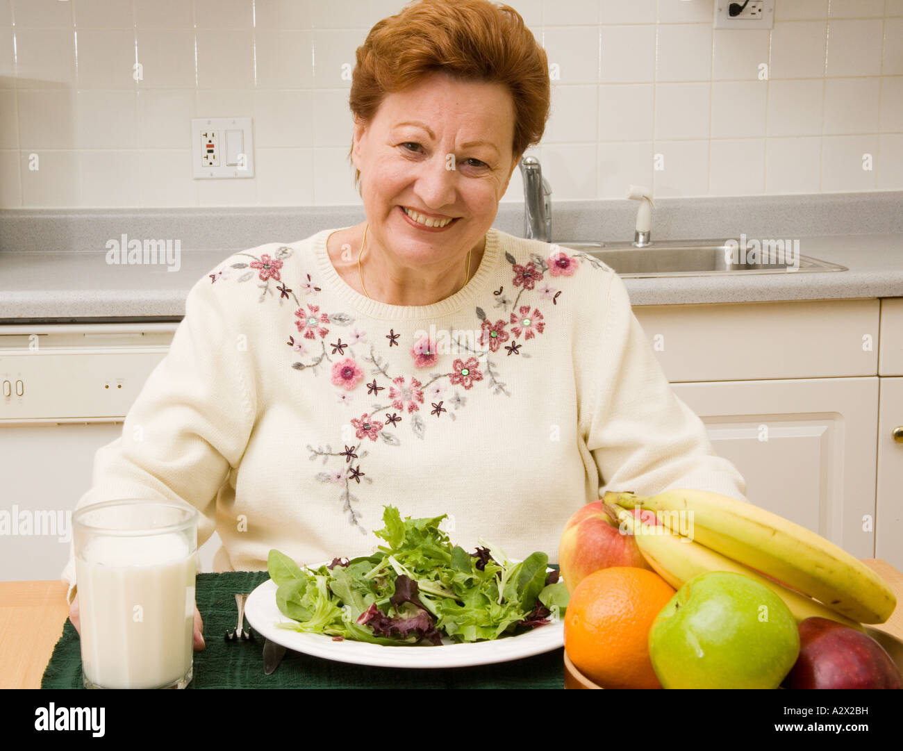 Woman eating healthy food Stock Photo - Alamy