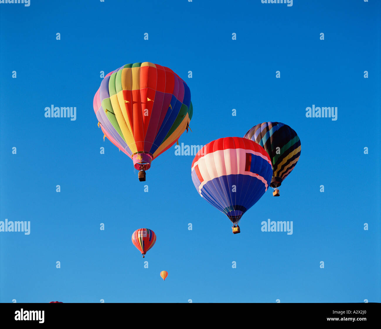 Low angle viewpoint of hot air balloons in flight Stock Photo - Alamy