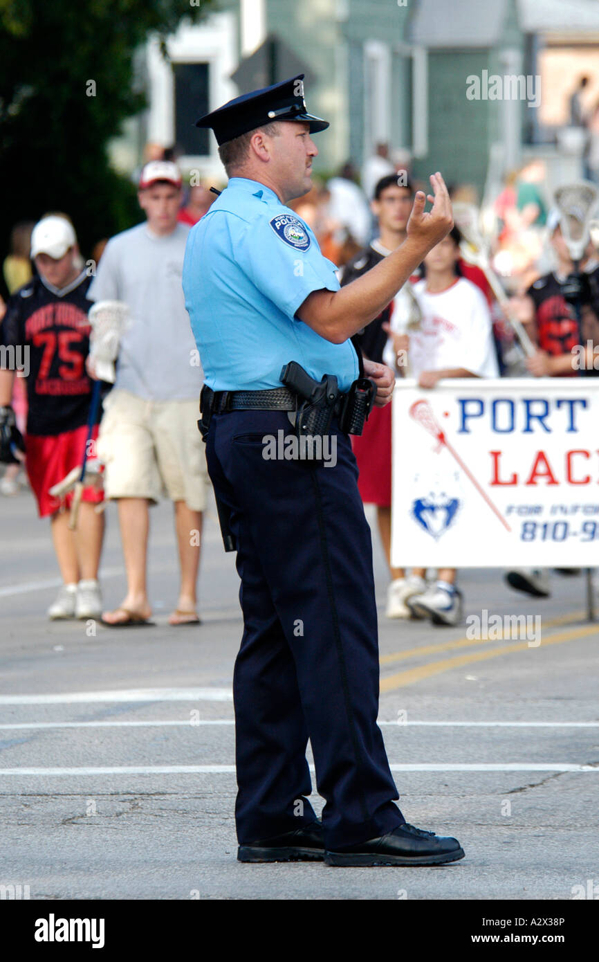 Male Police Officer on traffic duty in the suburbs of Detroit Michigan ...