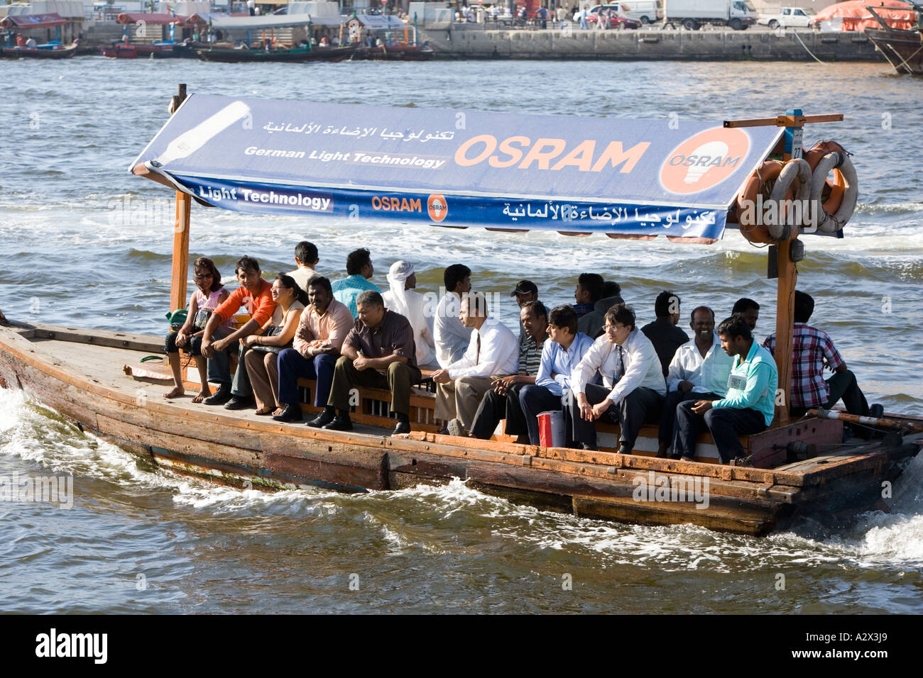 Crossing the Creek in Dubai by "Abra" (Water taxi Stock Photo - Alamy