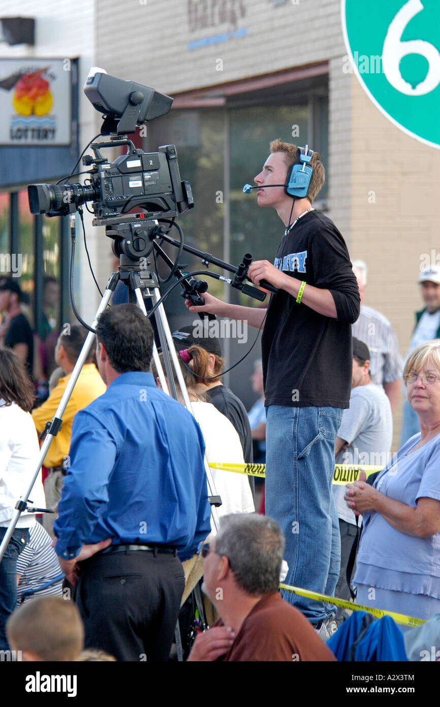 TV camera man filming a parade for the news channel in Detroit Michigan ...