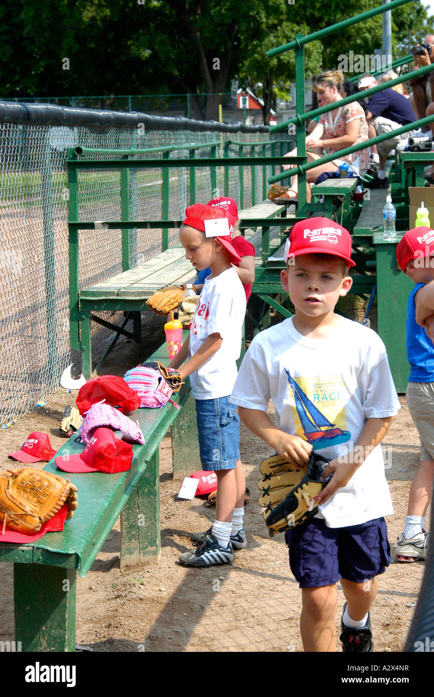 Pre-K Children taking part in a T Ball game at a summer childrens ...