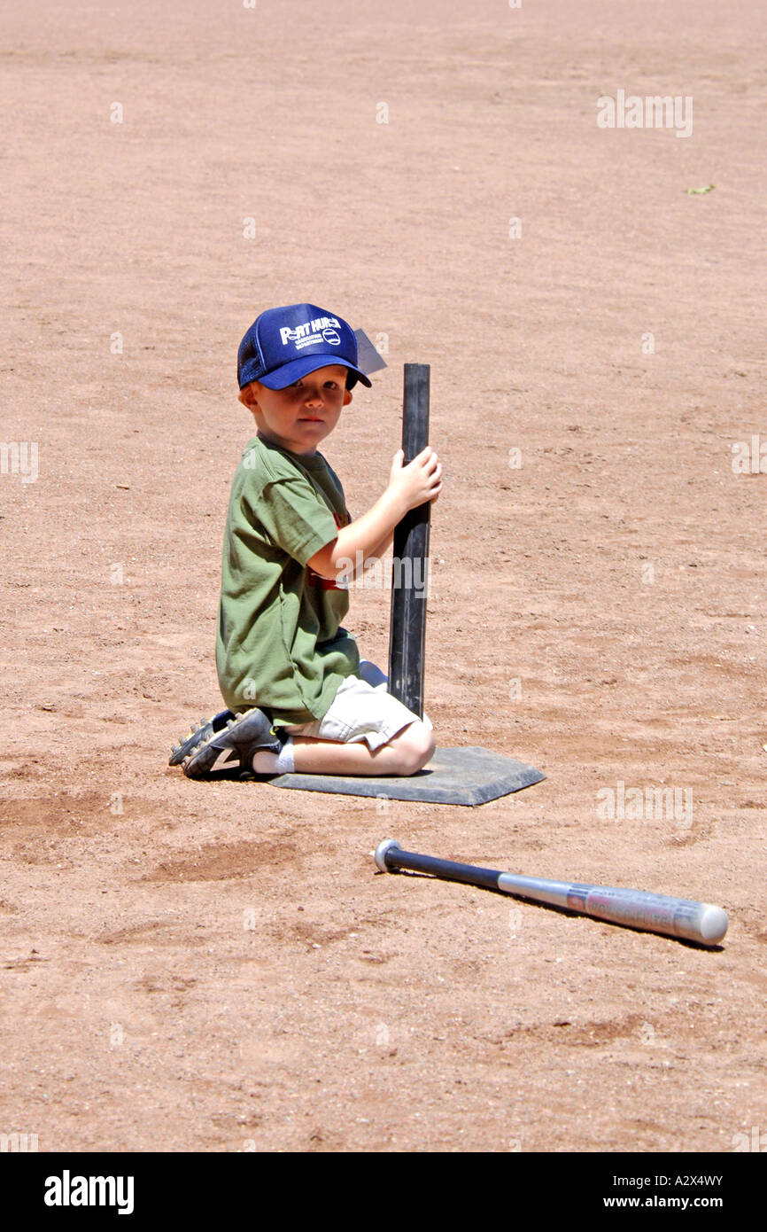 Young boy taking part in a Pre-K T-Ball practice game Stock Photo - Alamy