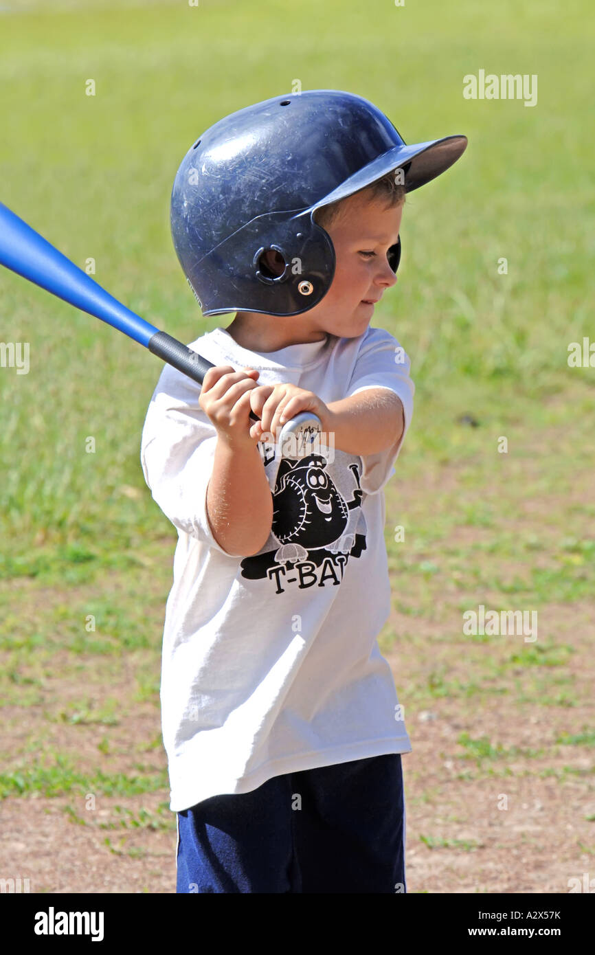 Young boy taking part in a Pre-K T-Ball practice game Stock Photo - Alamy