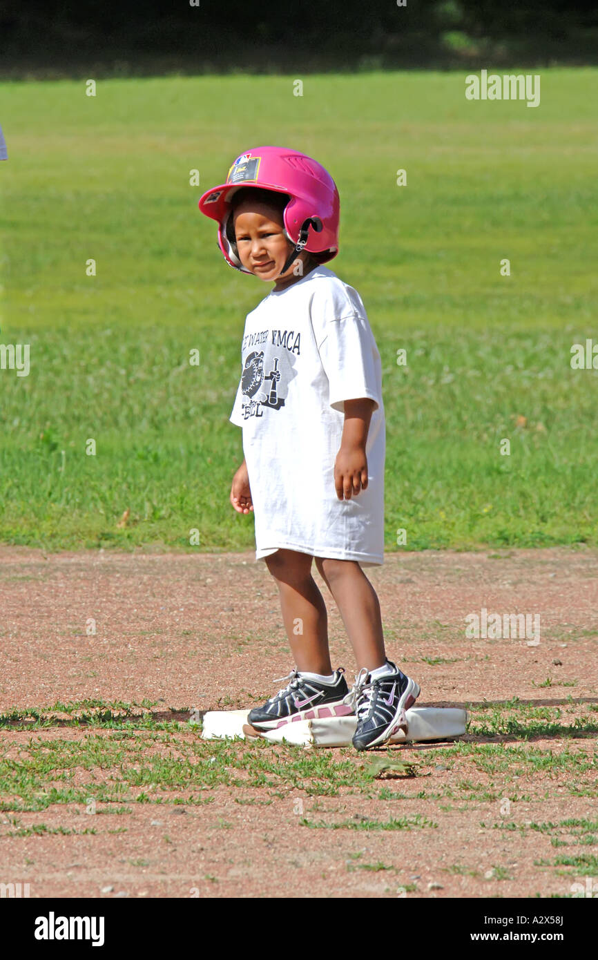 Ethnic pre-K child playing T Ball and having fun Stock Photo - Alamy