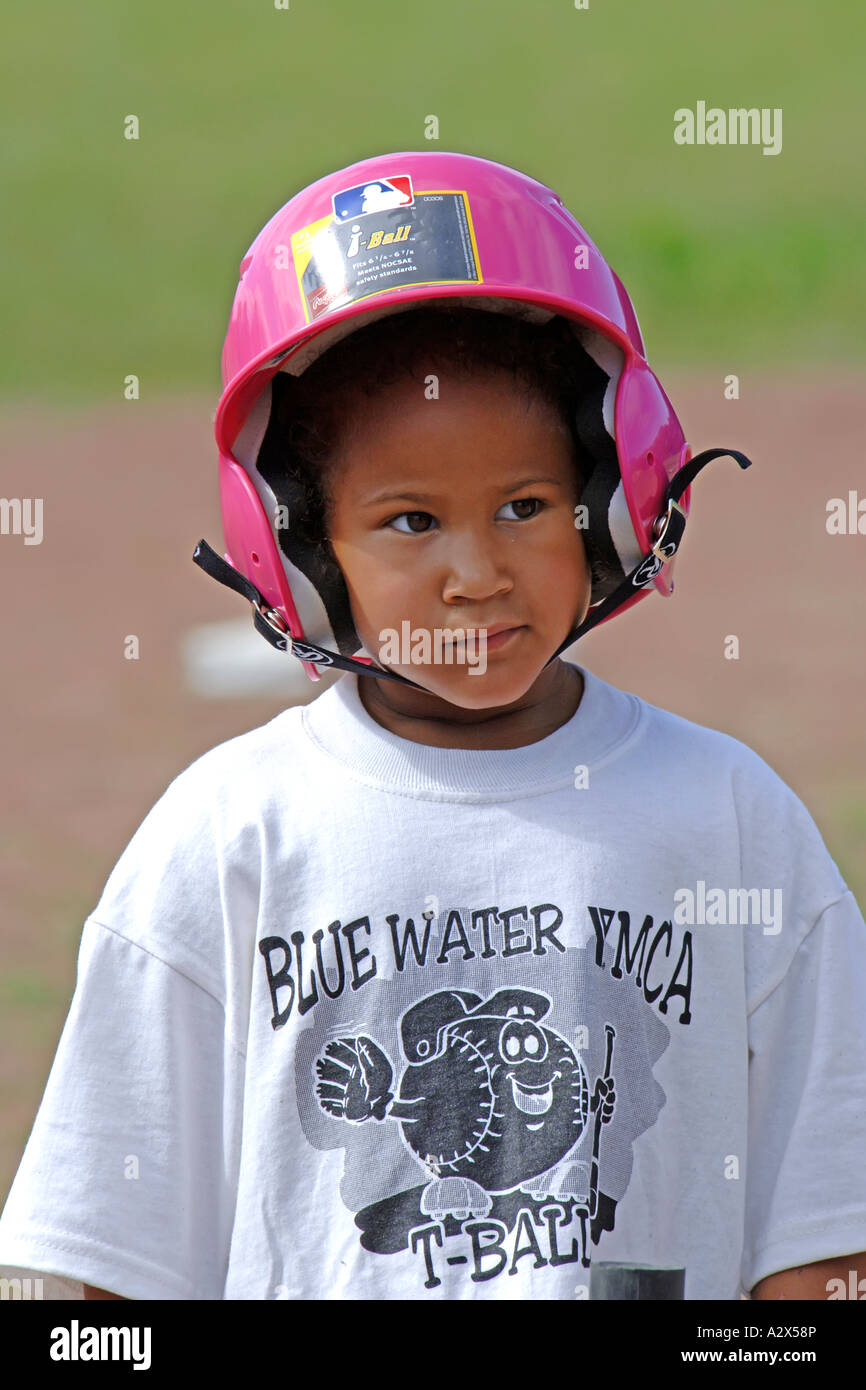 Multi-ethnic pre-K child playing T Ball and having fun Stock Photo - Alamy