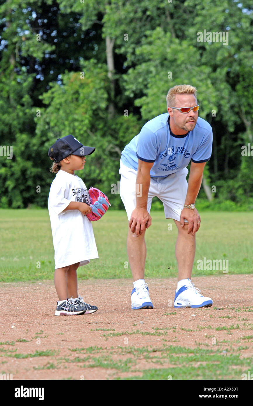 Pre-K Children Playing T-Ball with their parents Stock Photo - Alamy