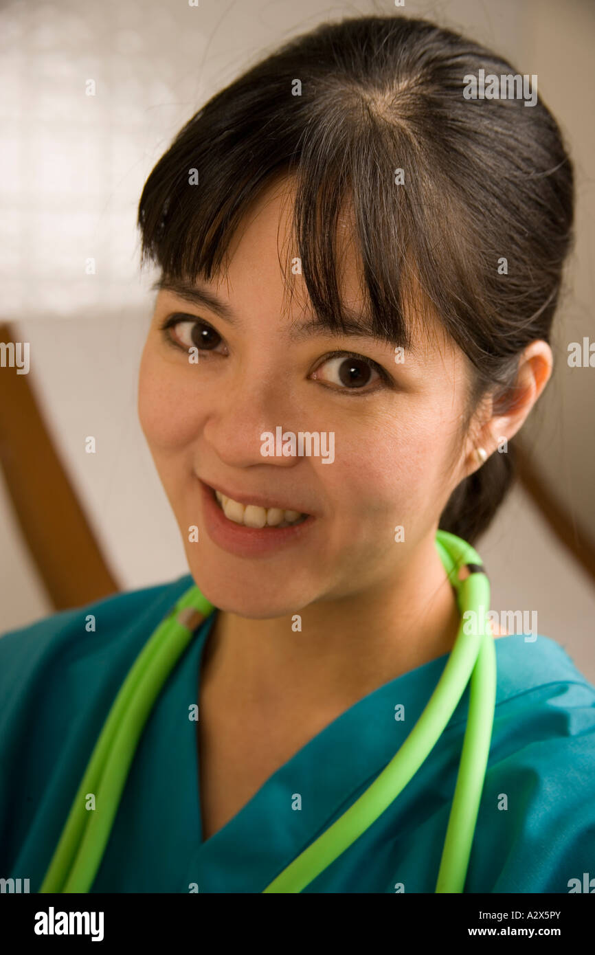 Portrait of a nurse in an exam room Stock Photo - Alamy