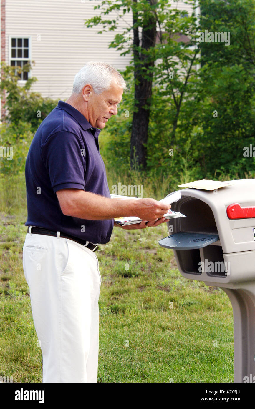 Collecting Mail From Post Box High Resolution Stock Photography and ...