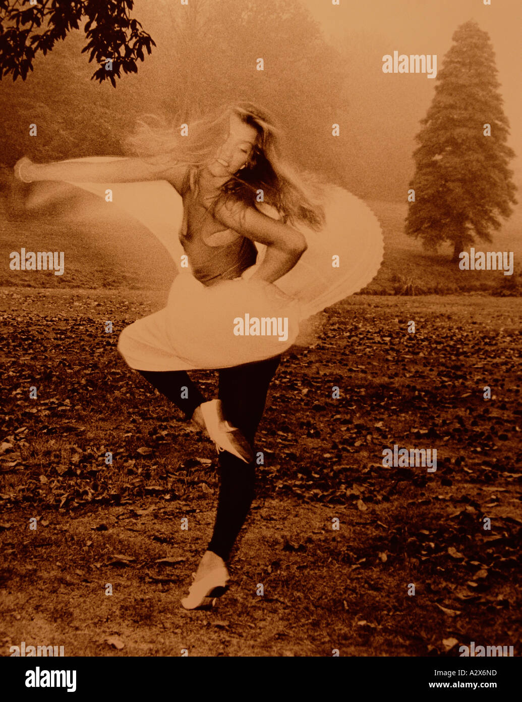 Woman dancer outdoors in park. Motion impression Stock Photo - Alamy