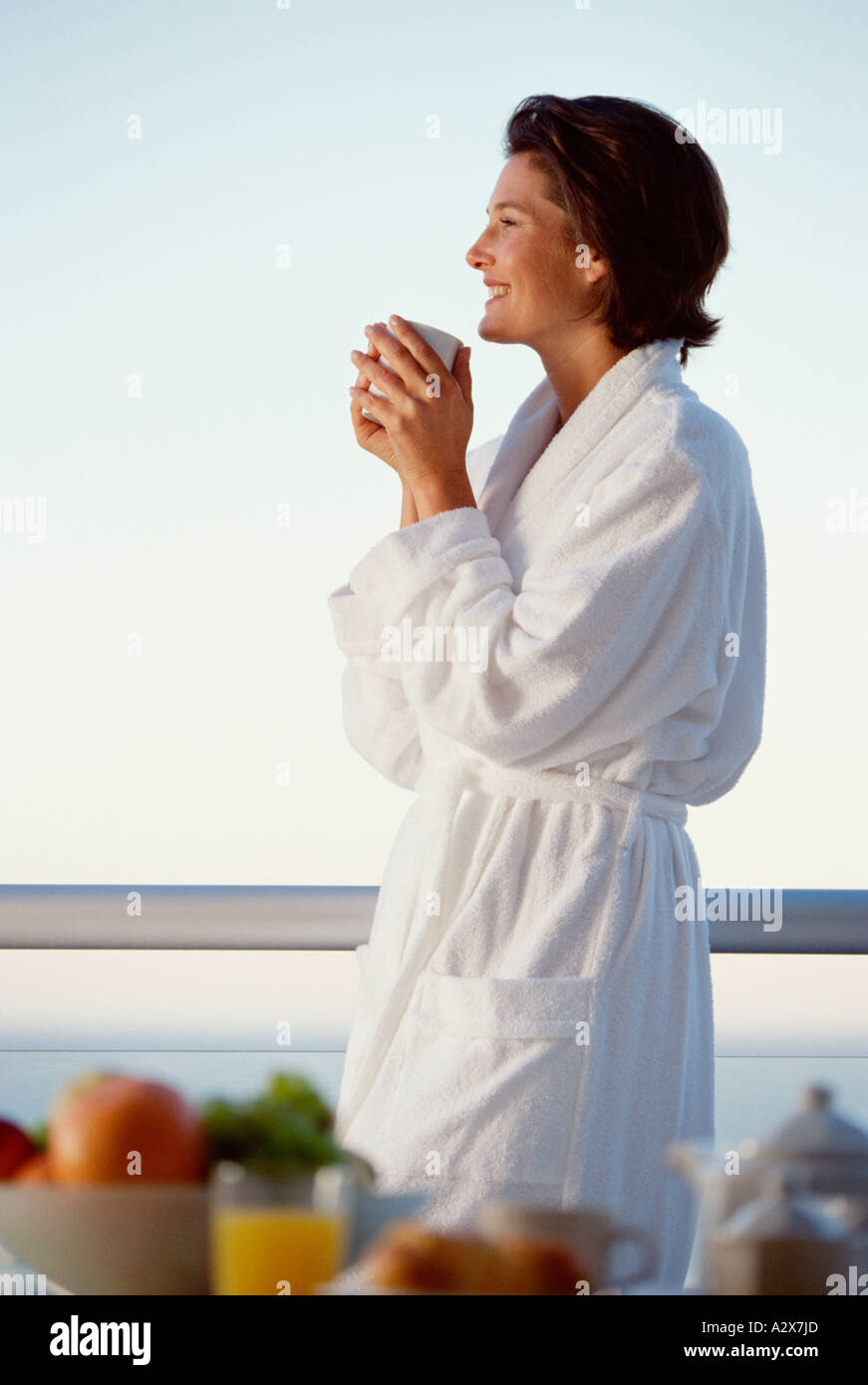 Woman sipping tea hi-res stock photography and images - Alamy