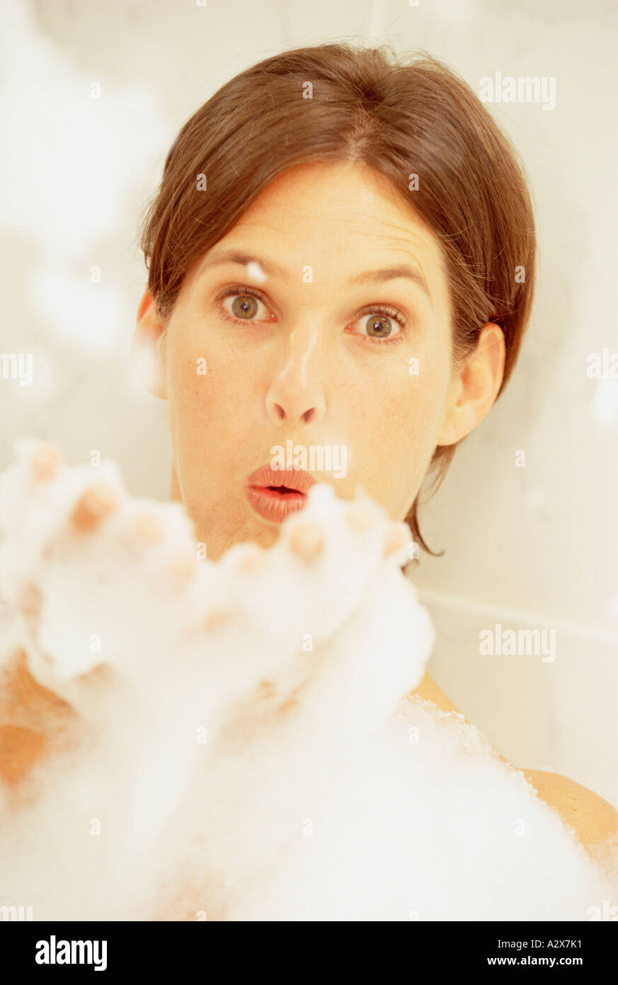 Woman bath blow bubbles hi-res stock photography and images - Alamy