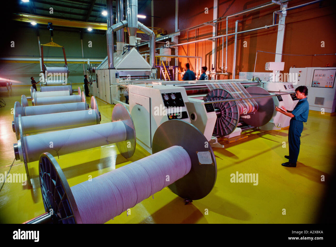 Factory industry workers machines hi-res stock photography and images ...