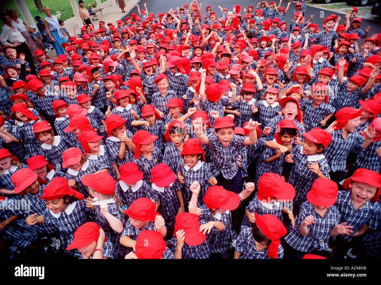 Large group of children cheering hi-res stock photography and images ...