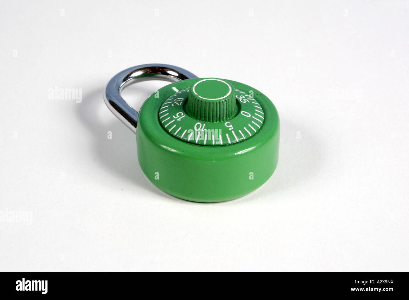 Green combination Padlock against a white background Stock Photo - Alamy