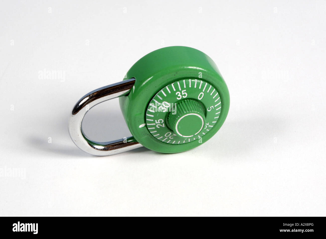 Green combination Padlock against a white background Stock Photo - Alamy