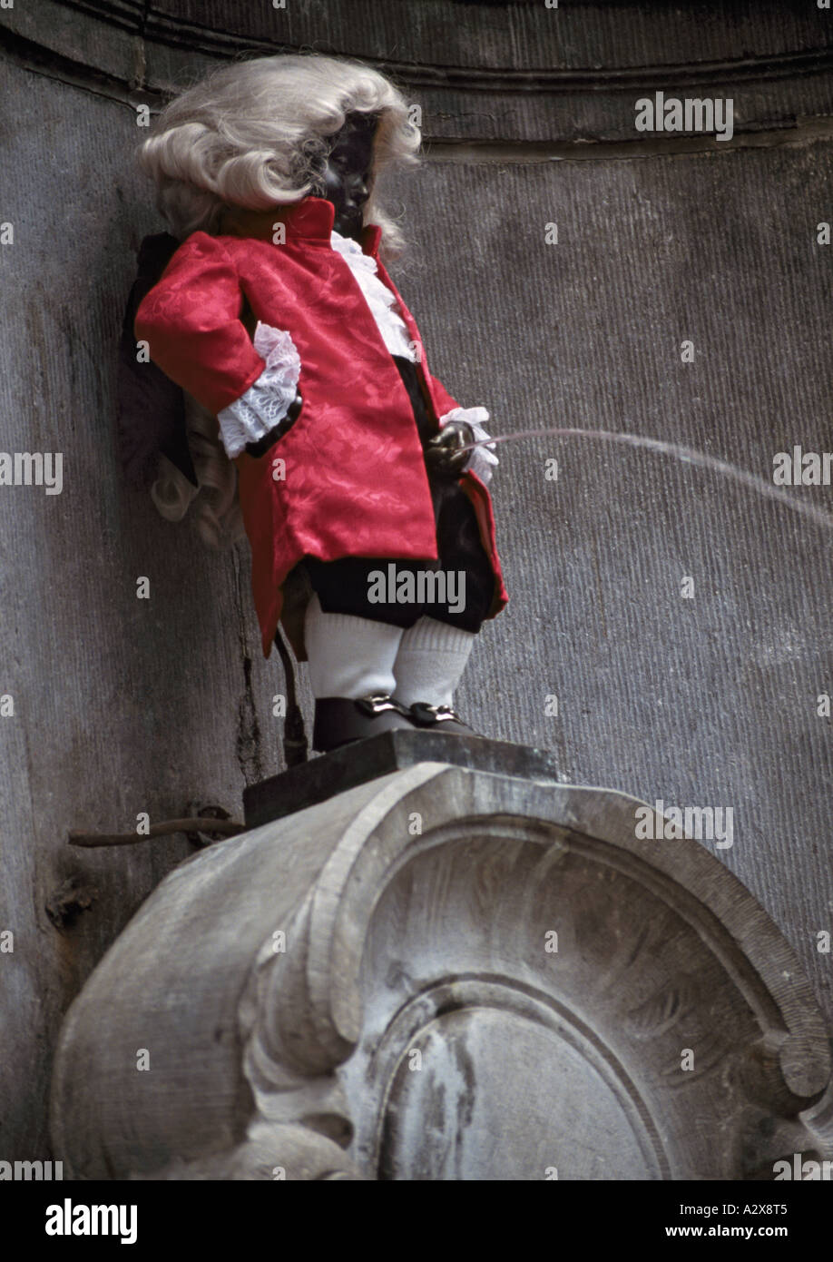 Manneken Pis in one of his many costumes here dressed as Mozart ...