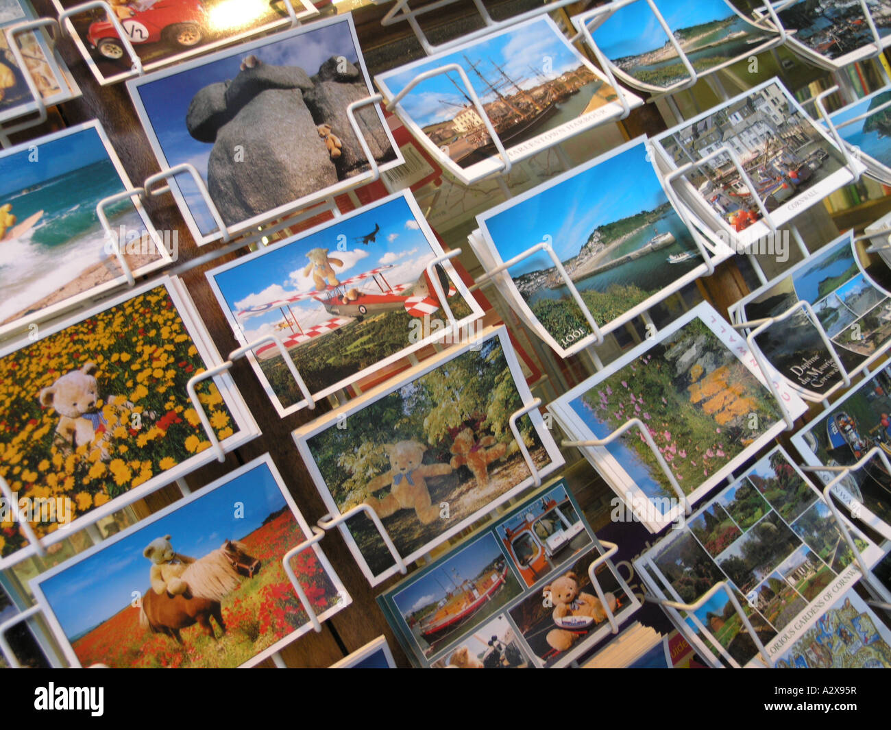 Cornish post cards on display in a rack Stock Photo - Alamy