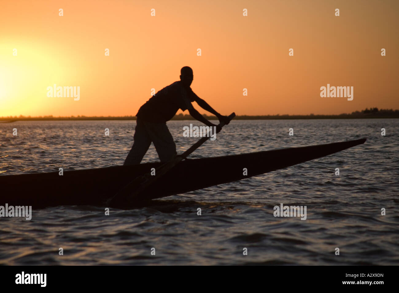 Pirogue on the Bani river at sunset at Mopti, Mali, West Africa Stock ...