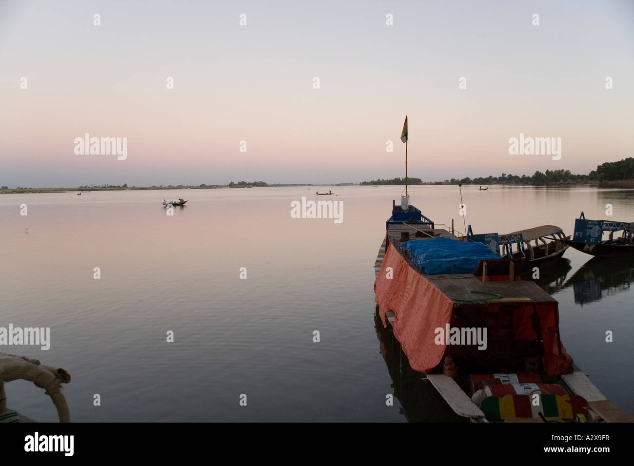 Pirogues on the Bani river in the early morning at Mopti, Mali, West ...