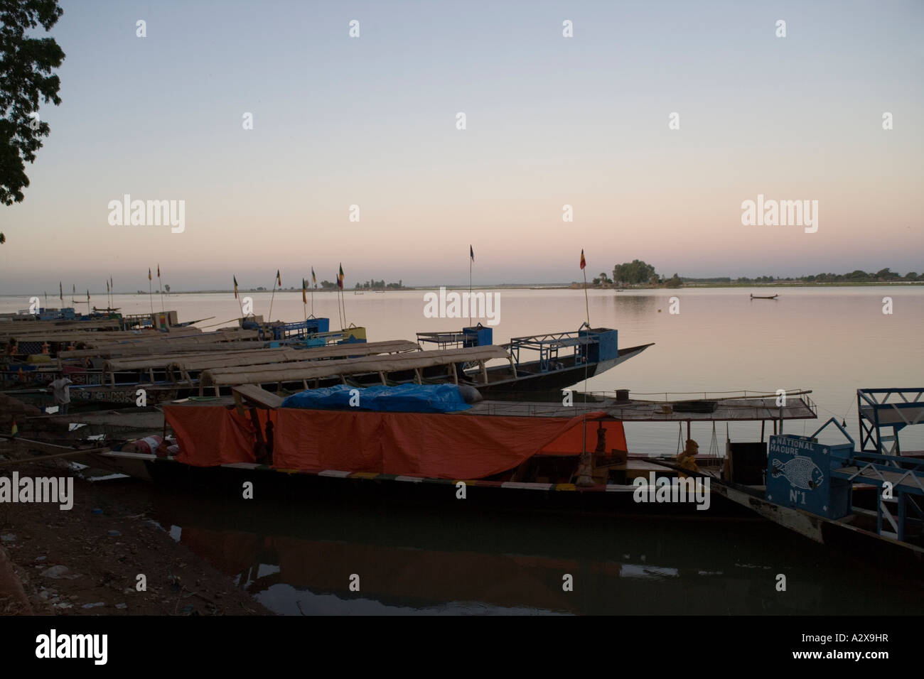 Pirogues on the Bani river in the early morning at Mopti, Mali, West ...