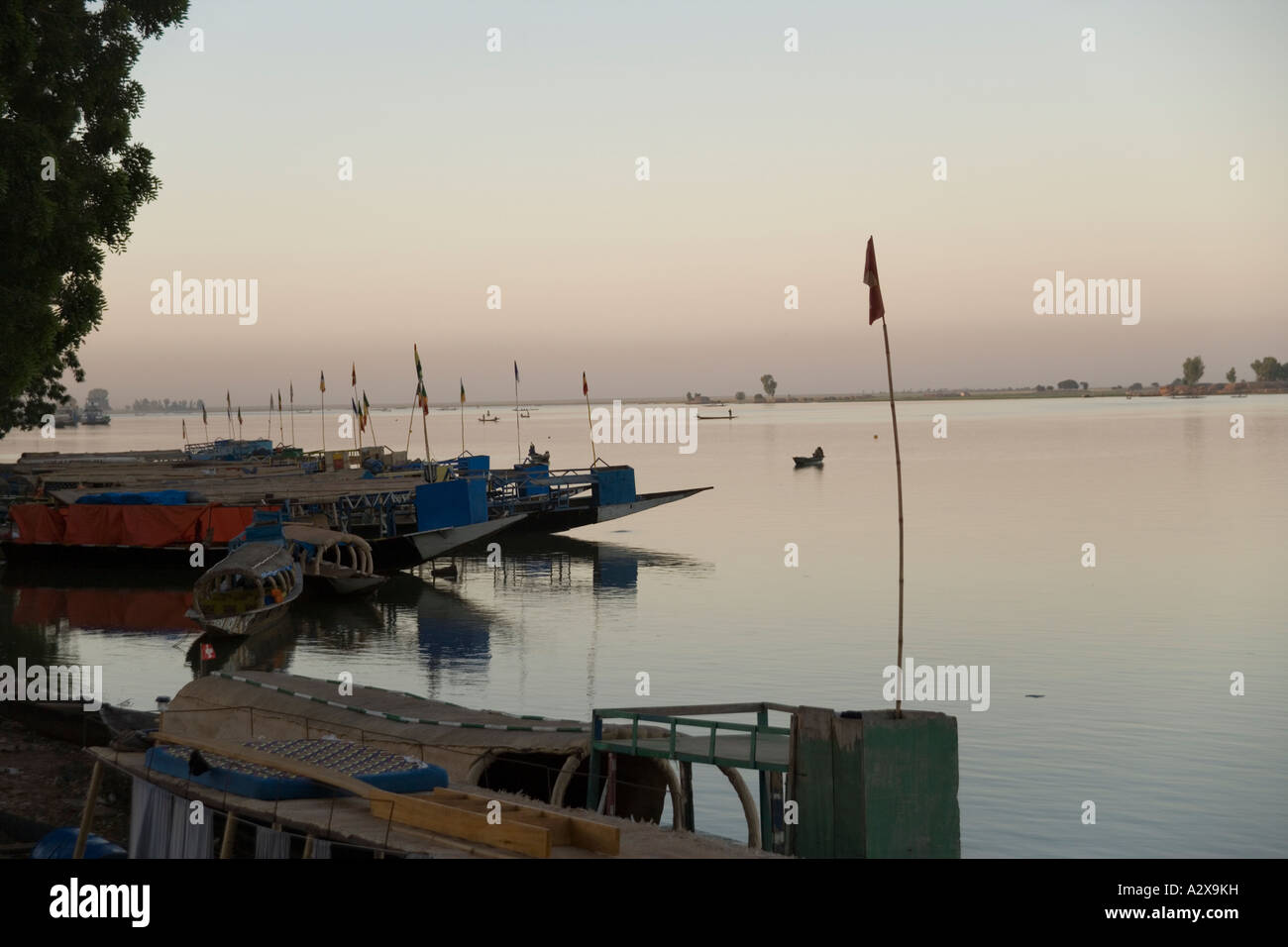 Pirogues on the Bani river in the early morning at Mopti, Mali, West ...