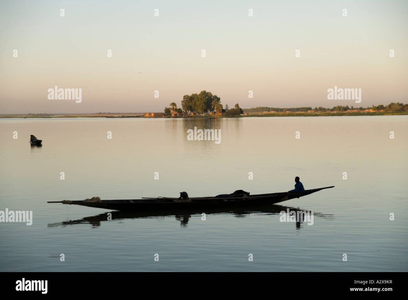 Pirogues on the Bani river in the early morning at Mopti, Mali, West ...