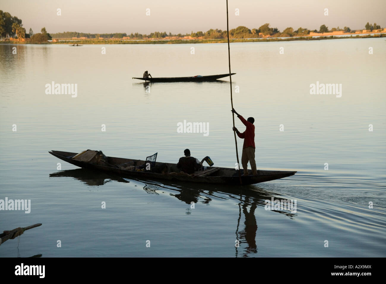 Pirogues on the Bani river in the early morning at Mopti, Mali, West ...