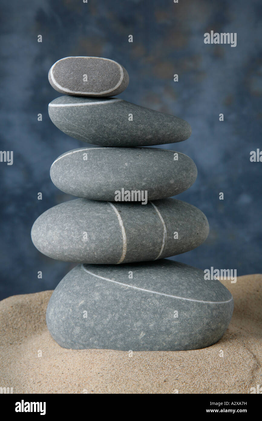 Five ancient stones in balance and harmony Stock Photo - Alamy
