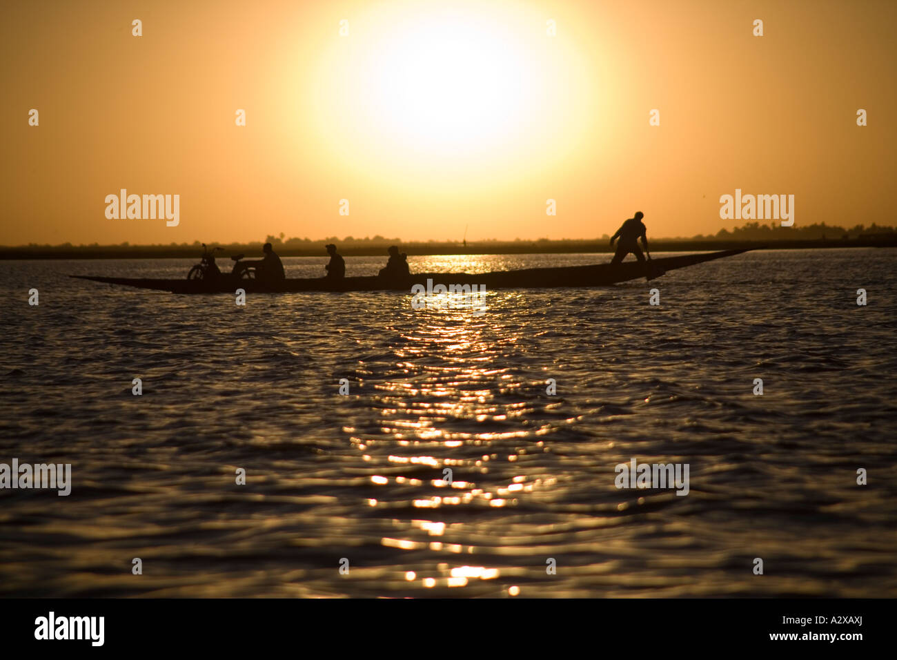 Pirogues on the Bani river at sunset at Mopti, Mali, West Africa Stock ...