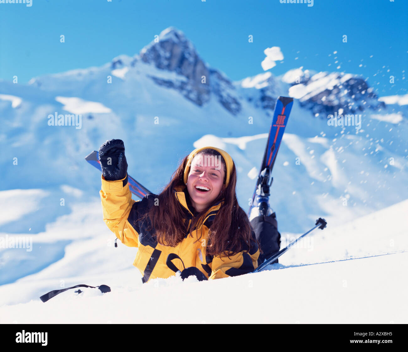 Female skier lying in snow hi-res stock photography and images - Alamy