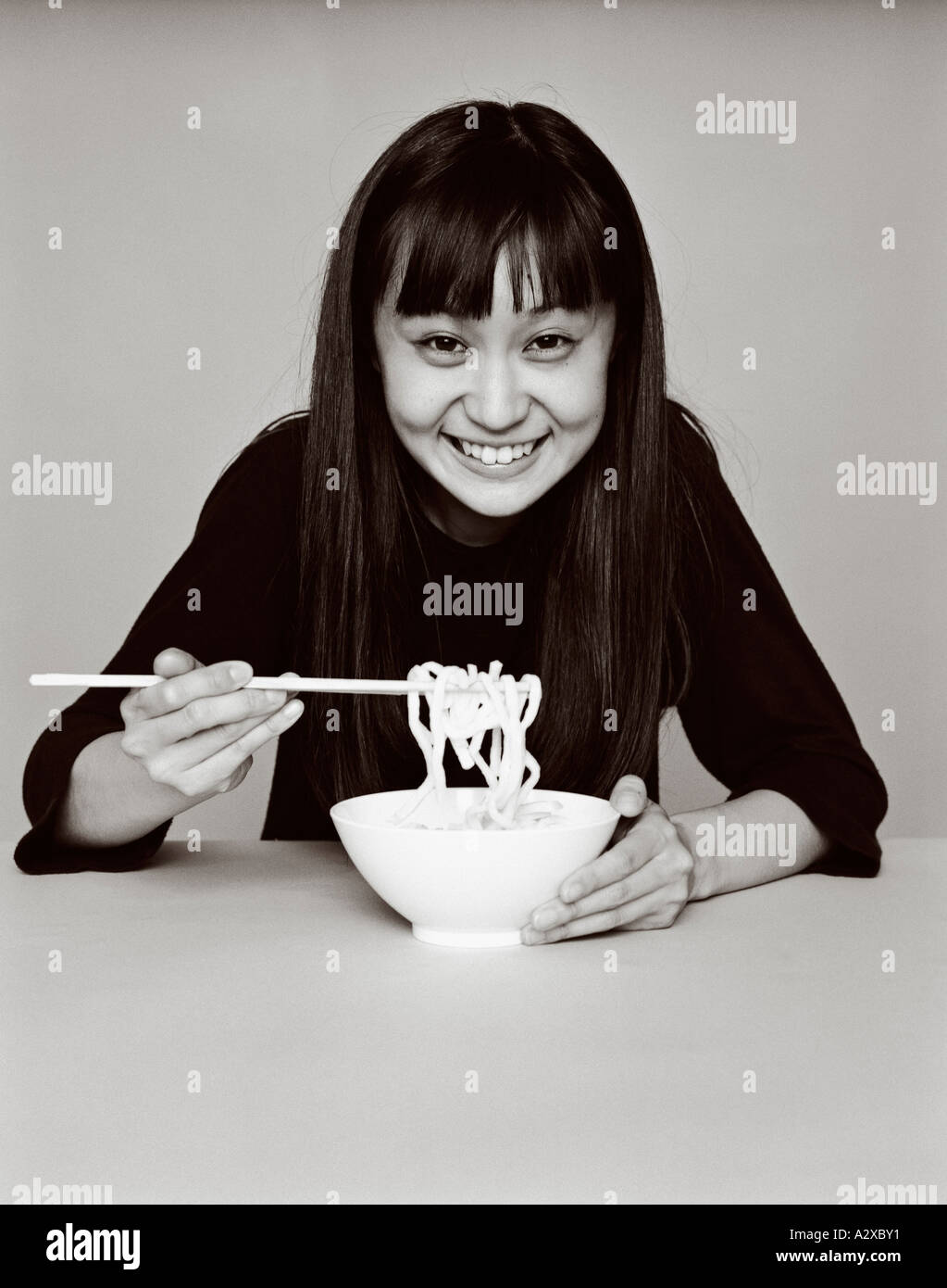 Seated young chinese woman hi-res stock photography and images - Alamy