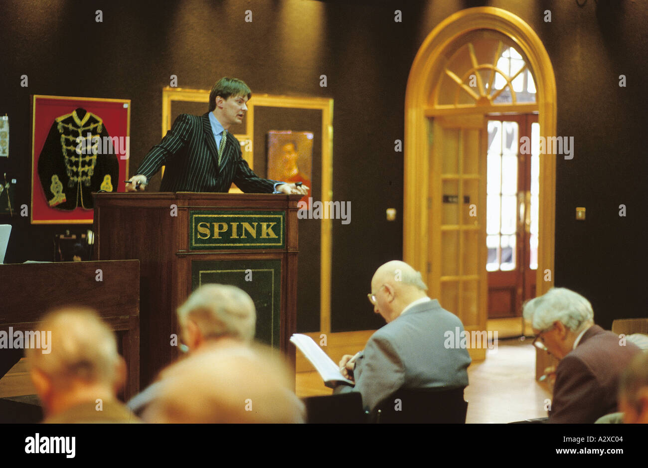 An auction in progress for a Victoria Cross Spink and Son London Stock ...