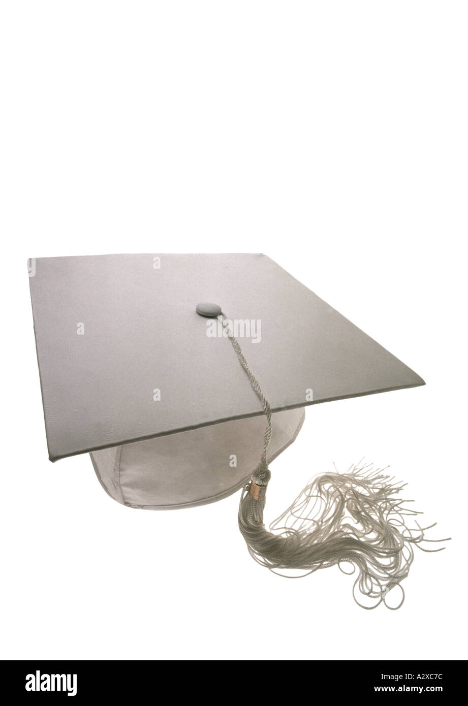 The life of a white graduation cap silhouetted on white background ...