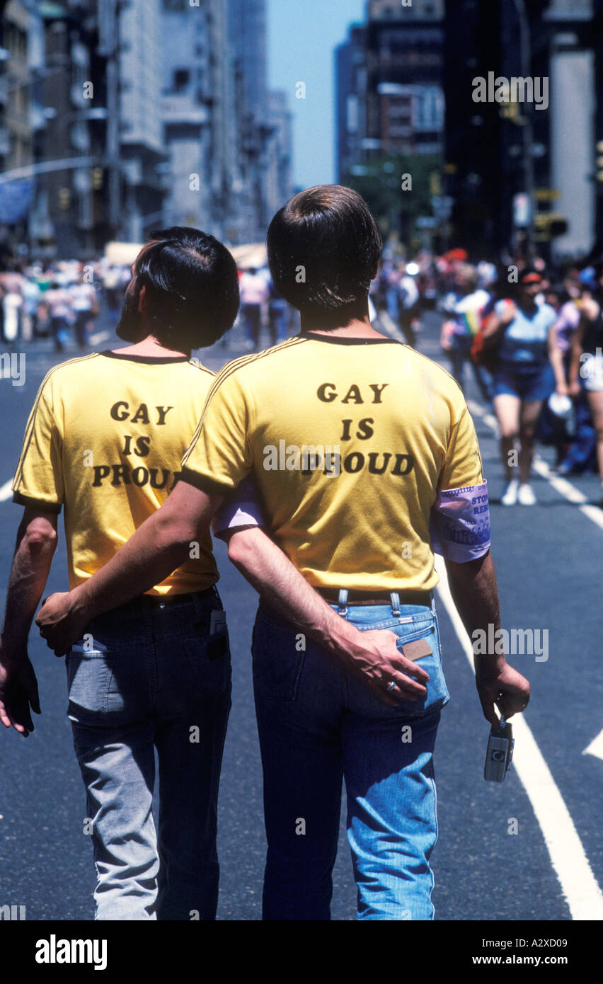 LGBTQ Pride 1980s USA. Two gay men at a Gay Parade 'Gay is Proud ...